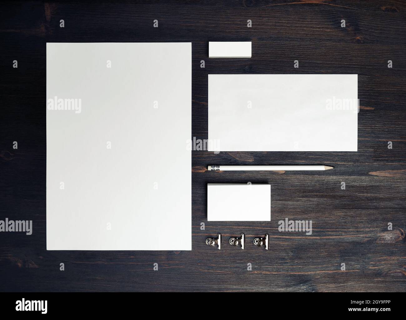 Blank corporate stationery set on wooden background. Template for ...