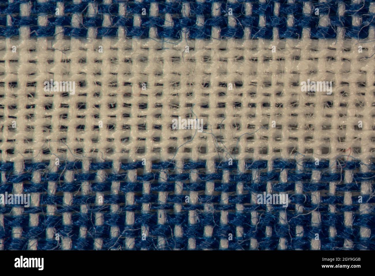 Fibers woven into a colorful fabric Stock Photo - Alamy