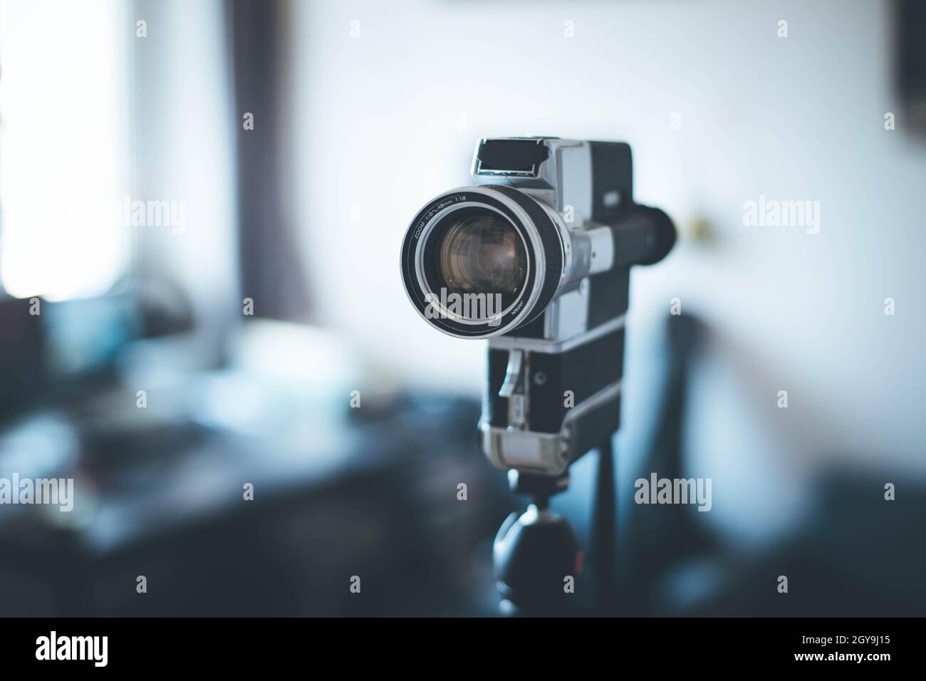 Vintage old movie camera indoor, copy space Stock Photo - Alamy