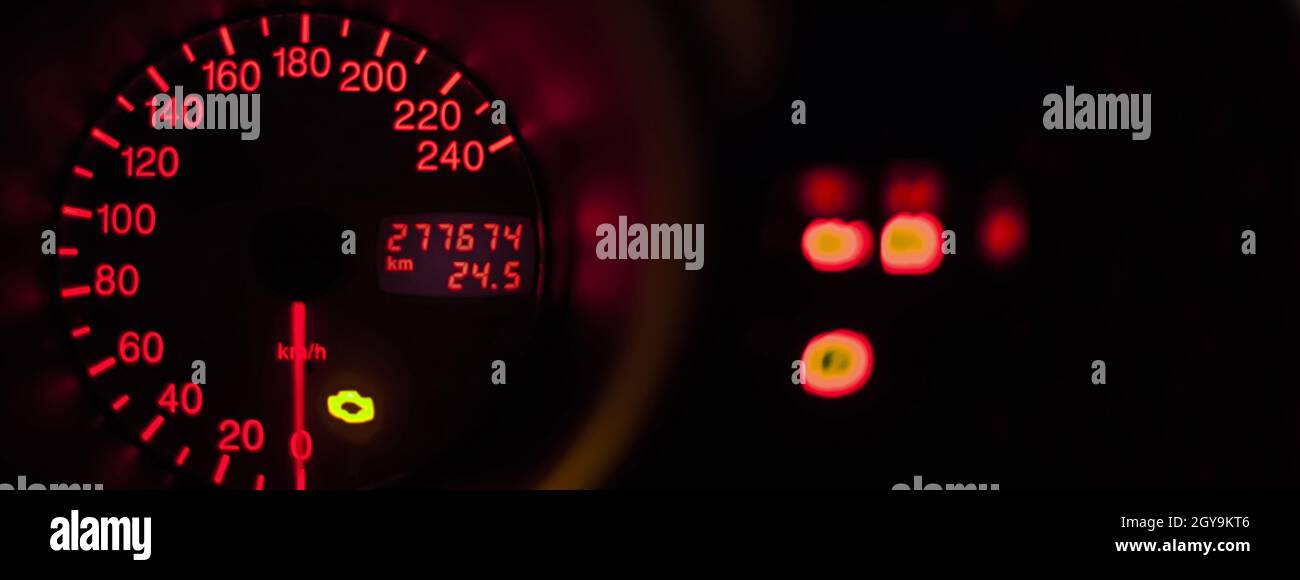 Car odometer illuminated, banner image with copy space Stock Photo - Alamy