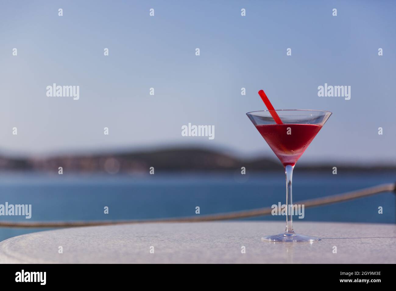 Cold glass of aperol spritz appetizer stand on table near the sea Stock ...