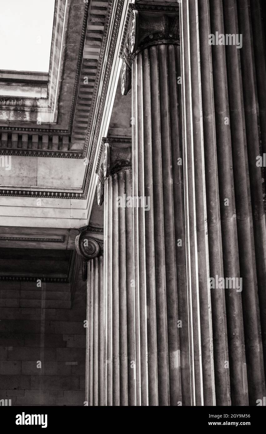 London, England - JUNE 16, 2018: Greek Ionic style columns and marble ...