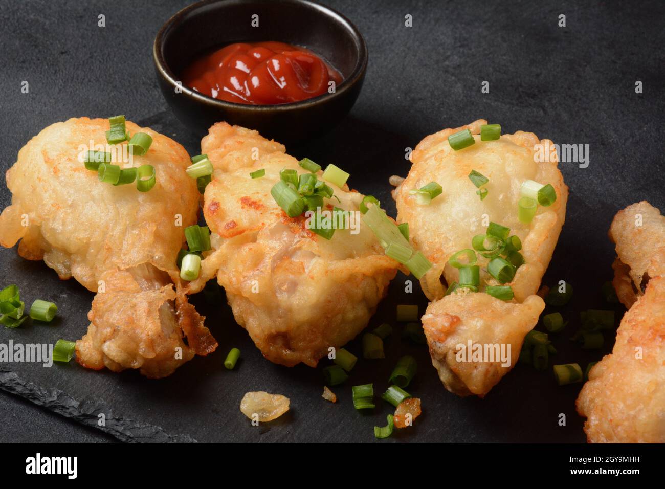 Golden crispy fried chicken drumsticks. Fried chicken pieces lightly ...