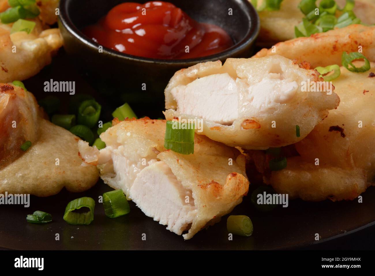 Golden crispy fried chicken fillet. Fried chicken pieces lightly ...