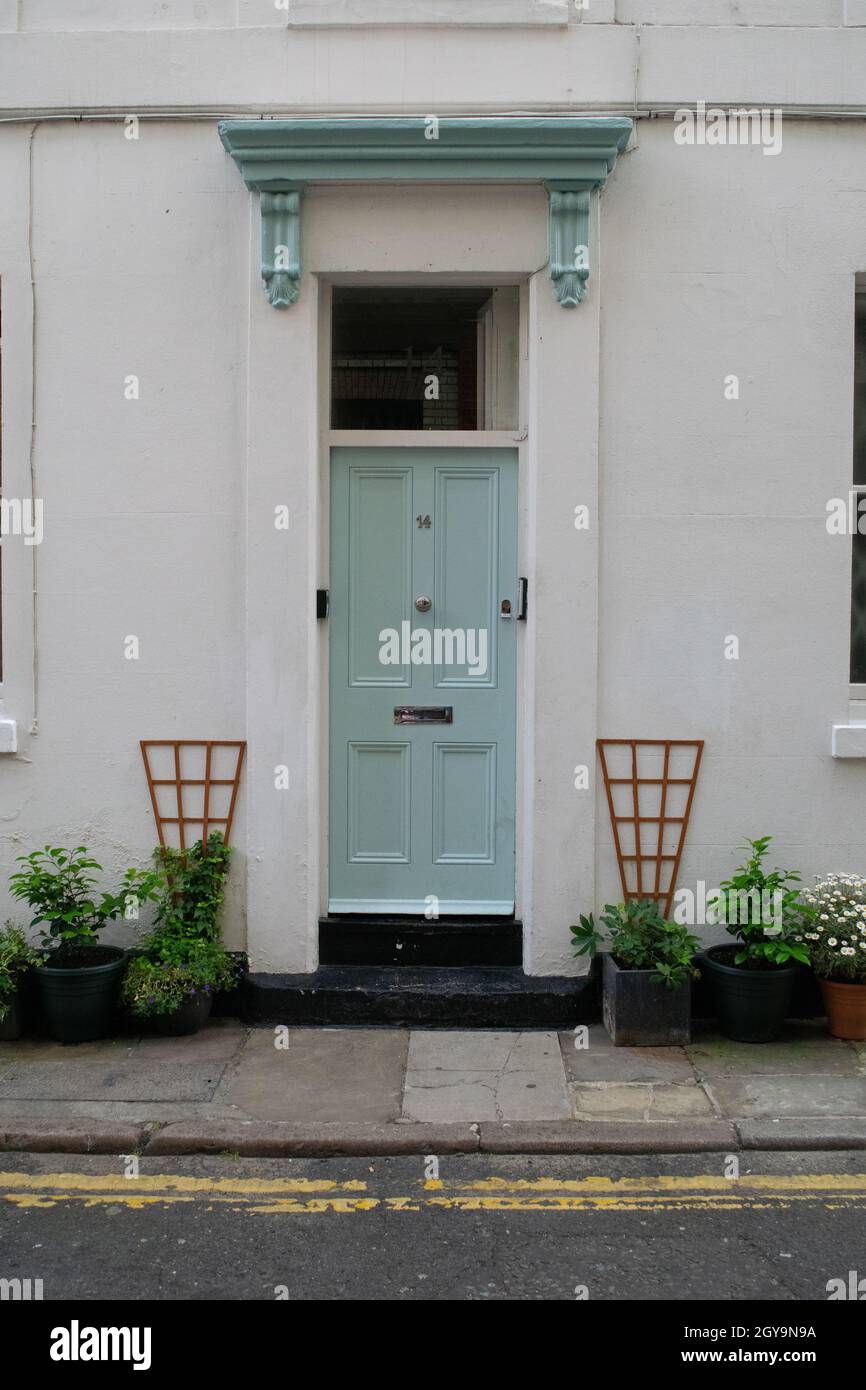 Light blue London traditional door with letterbox Stock Photo - Alamy