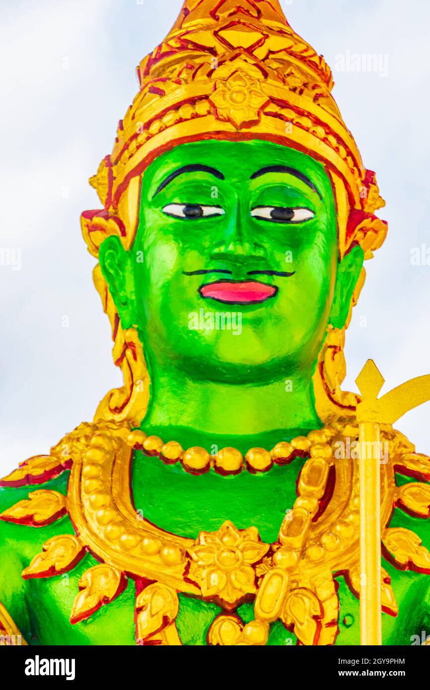 Green god statue and architecture in Wat Plai Laem temple on Koh Samui ...