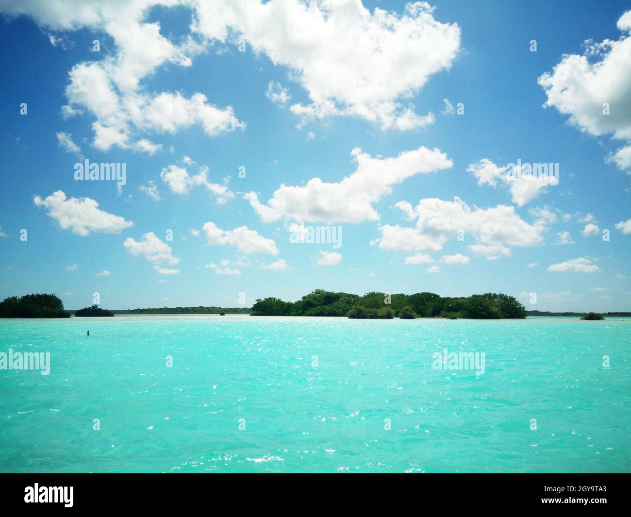 Azure lake surrounded green hi-res stock photography and images - Alamy