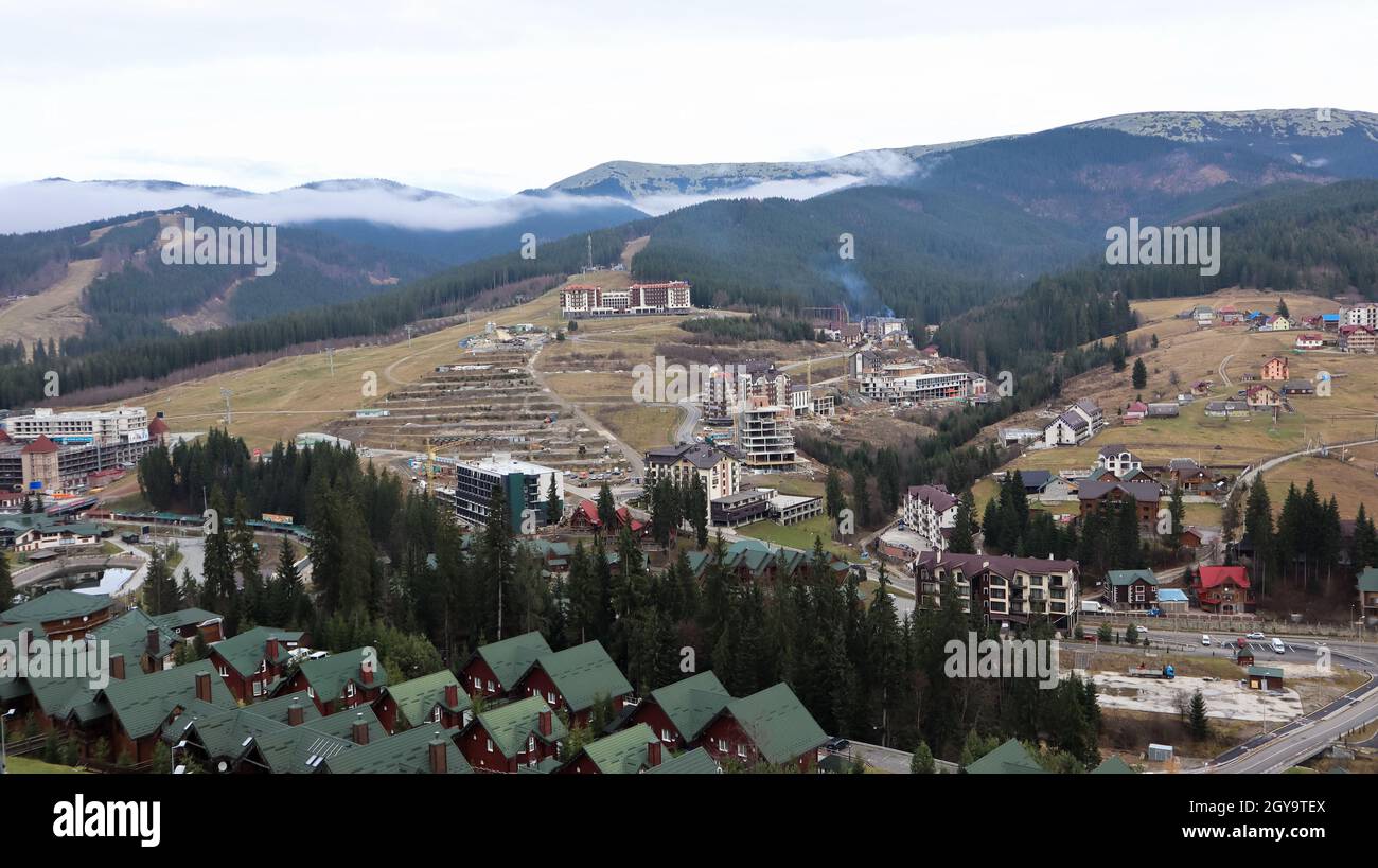 Bukovel ski resort in autumn aerial view. View of hotel houses in the ecological countryside ...