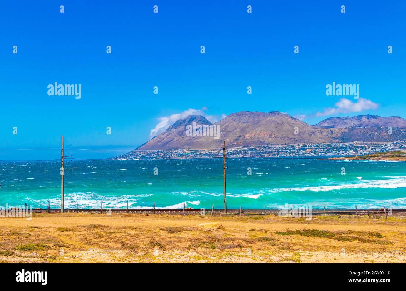 False Bay coast landscape with boulders beaches waves and mountains in ...