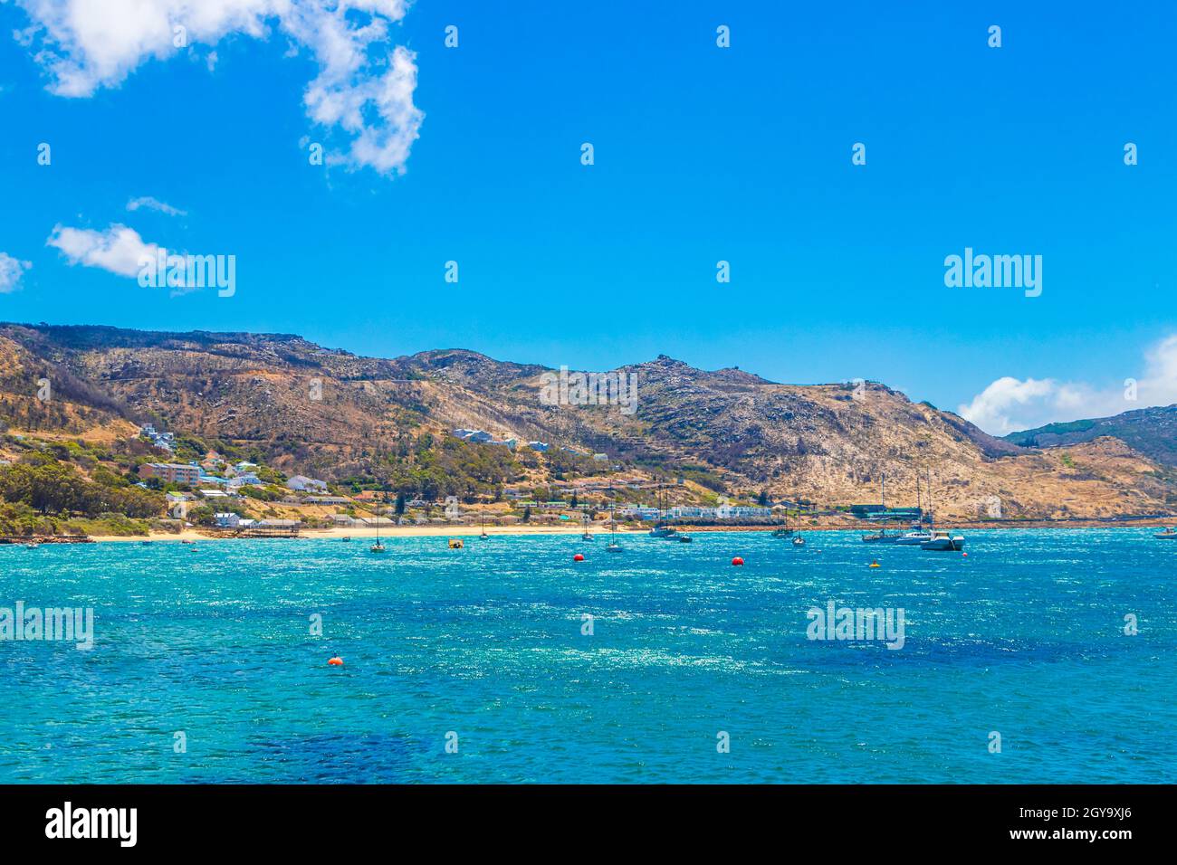 False Bay coast landscape with boulders beaches waves and mountains in ...