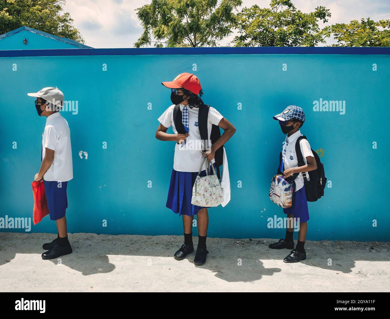 Boy wearing uniform in classroom hi-res stock photography and images ...