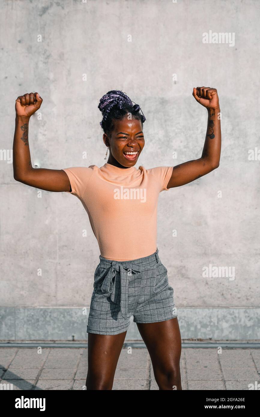 Woman raises sign in hi-res stock photography and images - Alamy