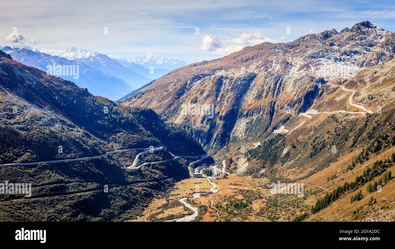 Scenic view of a switchback road through the mountains in Switzerland ...