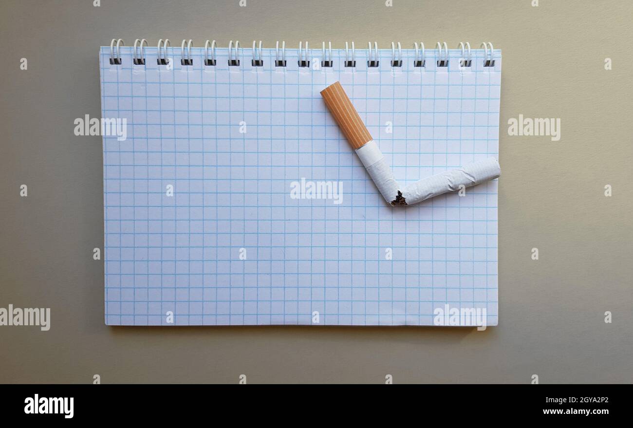 World No Tobacco Day, No Smoking Day. Broken cigarette on a business ...