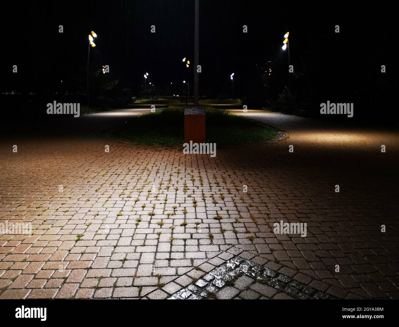 Empty sidewalk on a dark night Stock Photo - Alamy