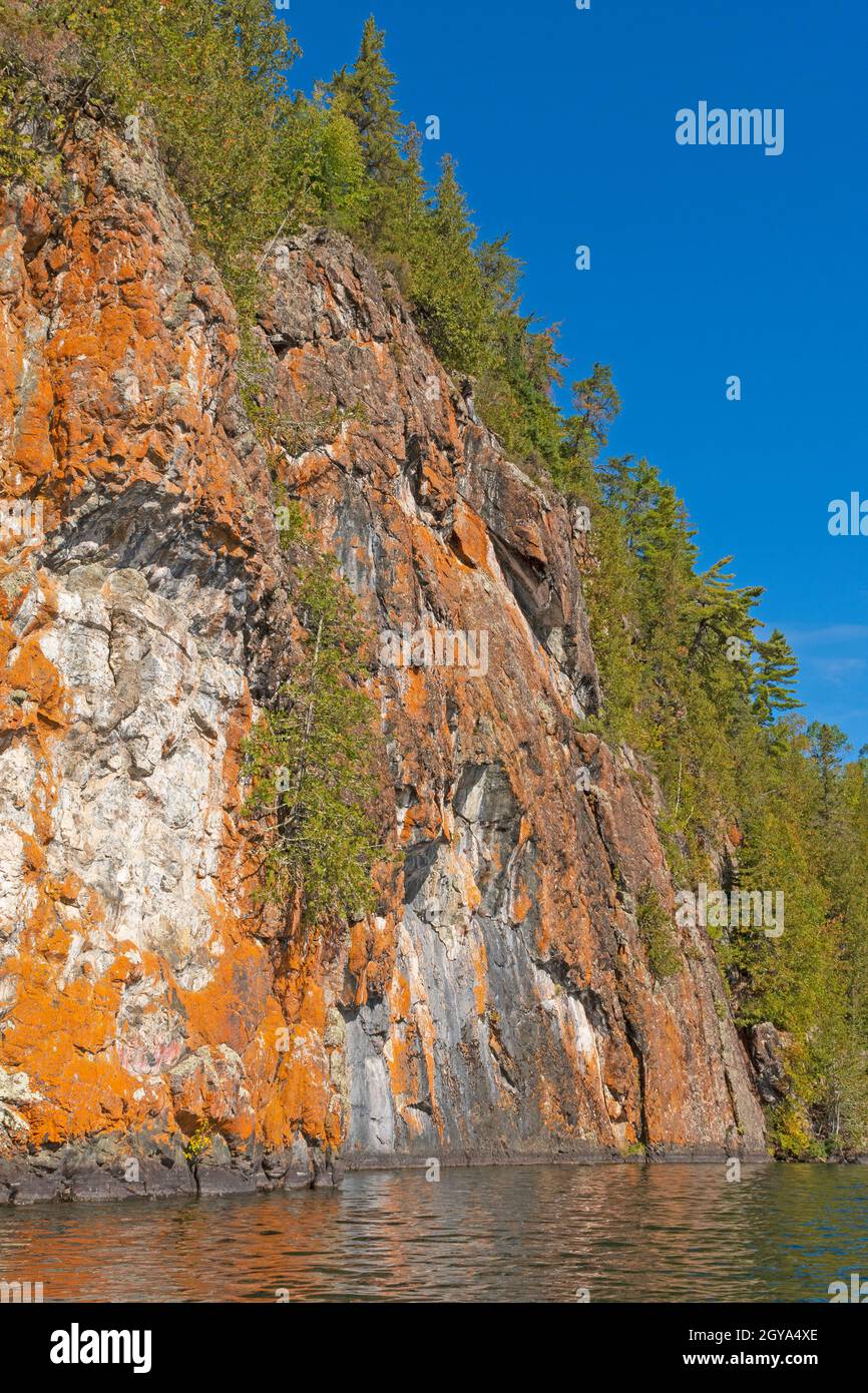 Orange Colored Cliffs High Above the Wilderness Waters on Ottertrack ...