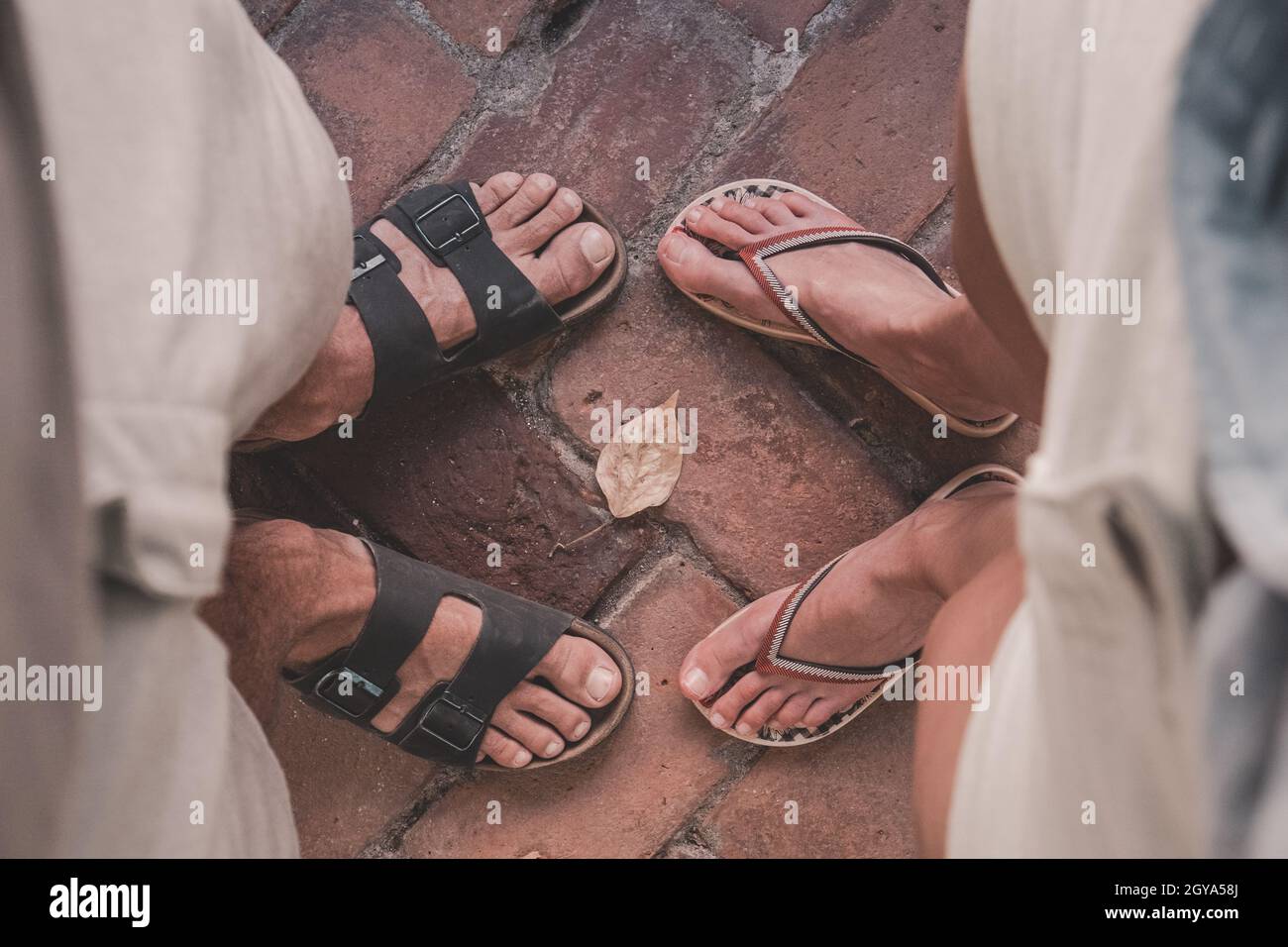 Male feet wearing sandals hi-res stock photography and images - Alamy