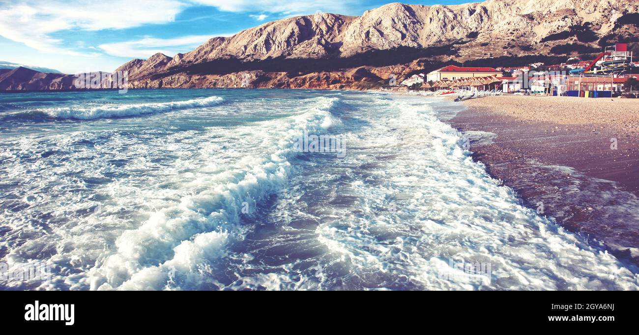 Feeling of freedom concept. Big waves beats against the pier Stock ...