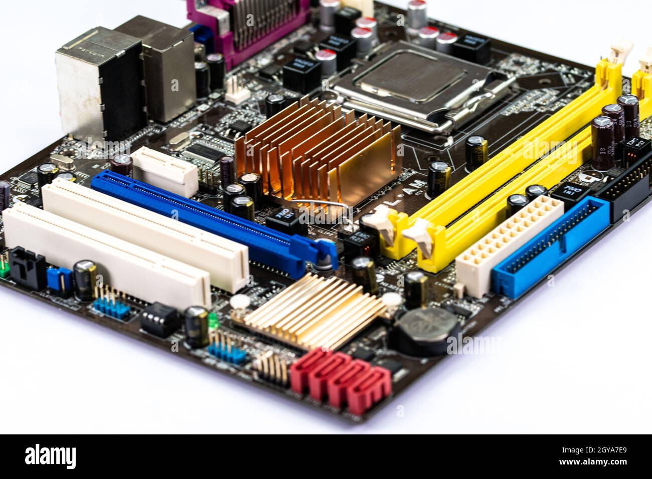 electronic motherboard of a pc disassembled on a white surface Stock ...