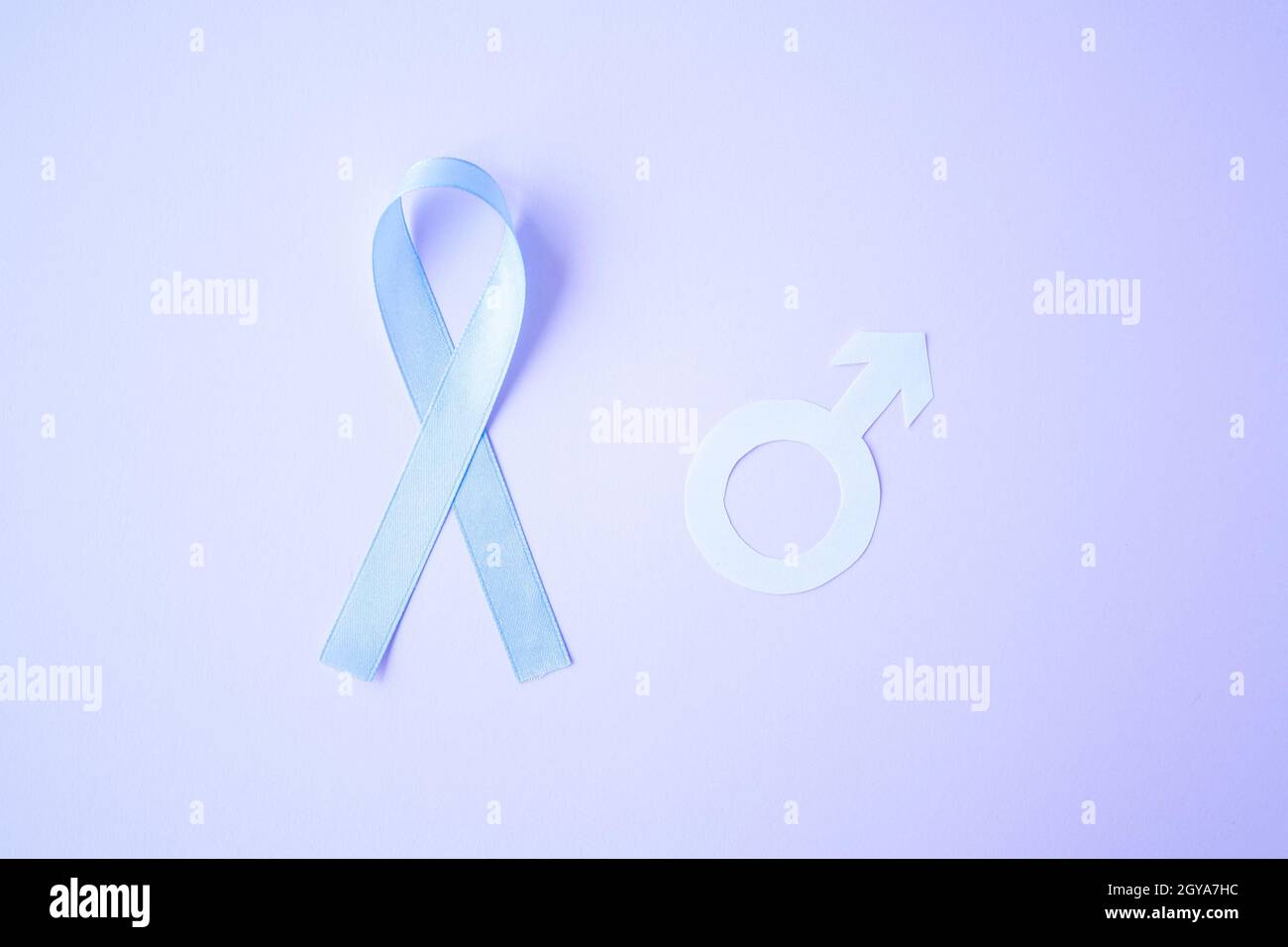 Prostate cancer awareness blue ribbon with white paper male sign mars ...