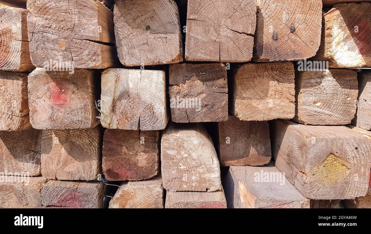 Stacked lumber. Folded wood.Closeup wooden boards.The surface of the ...