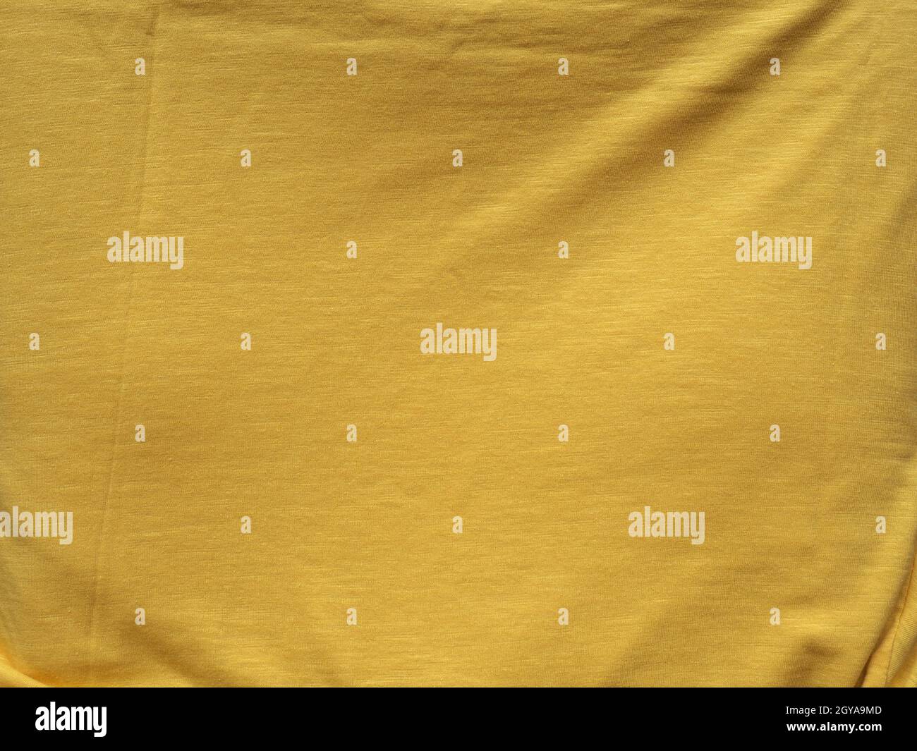yellow cotton fabric texture useful as a background Stock Photo - Alamy