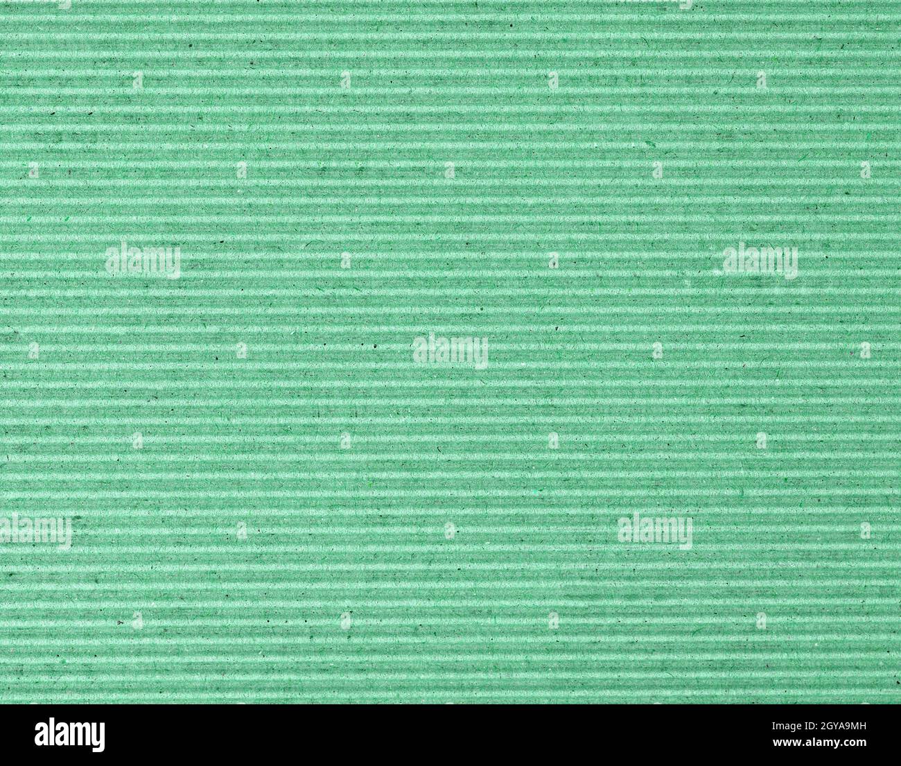 green cardboard texture useful as a background Stock Photo - Alamy