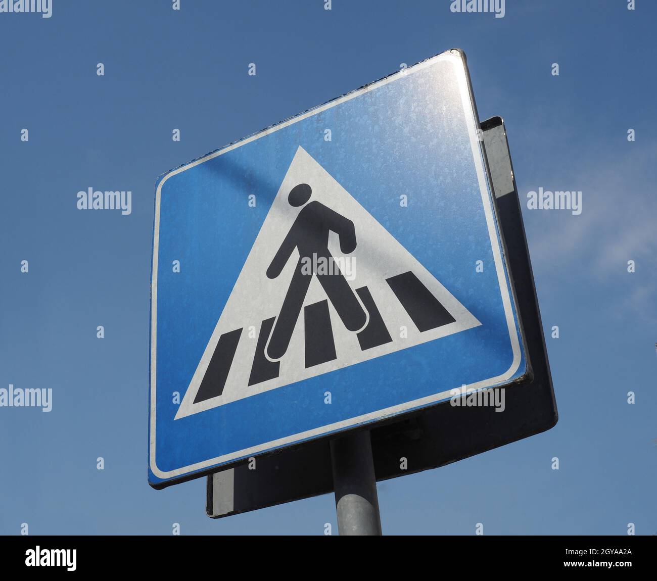Warning signs, zebra crossing traffic sign over blue sky Stock Photo ...