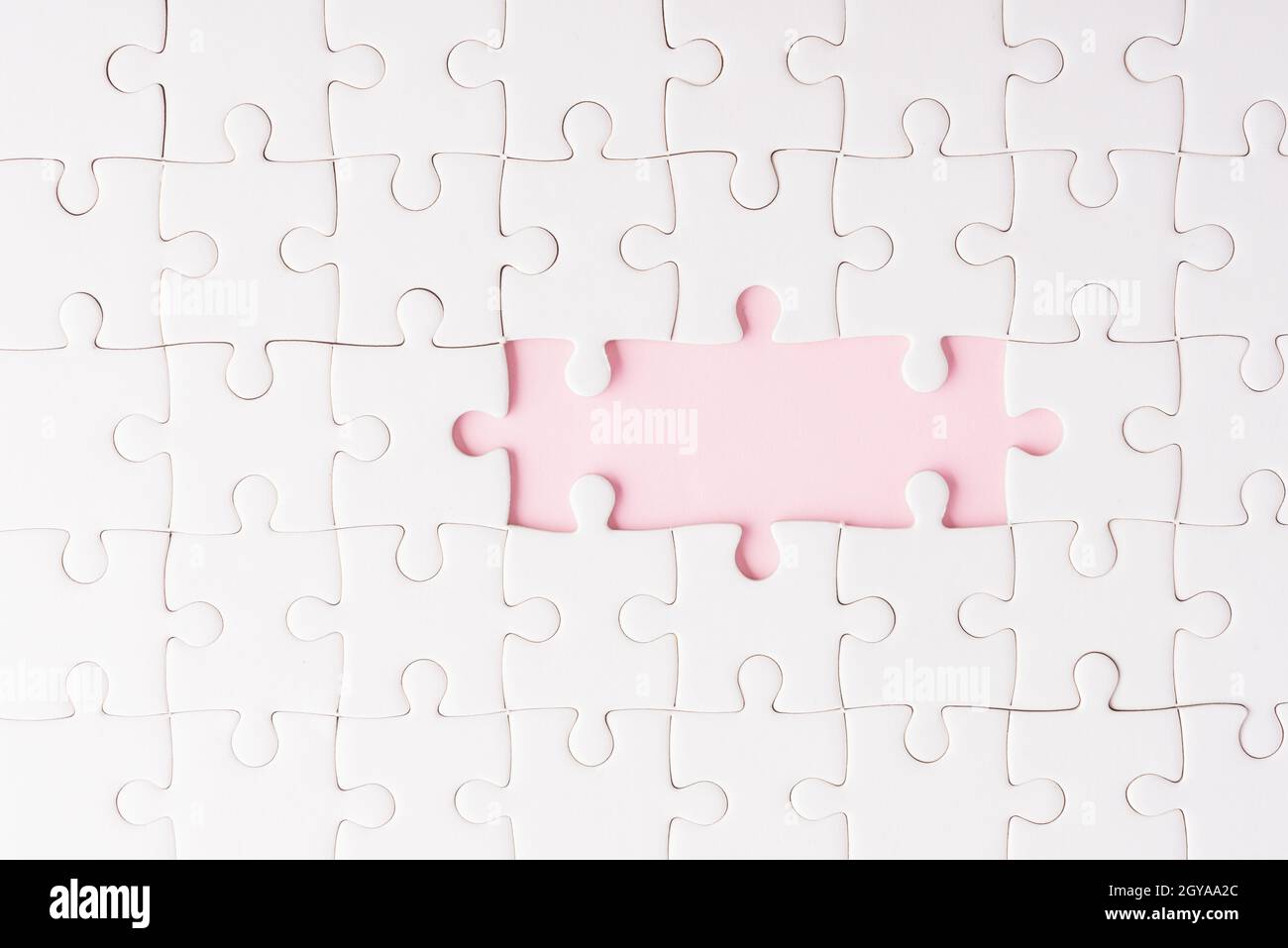 Top view flat lay of paper plain white jigsaw puzzle game texture ...