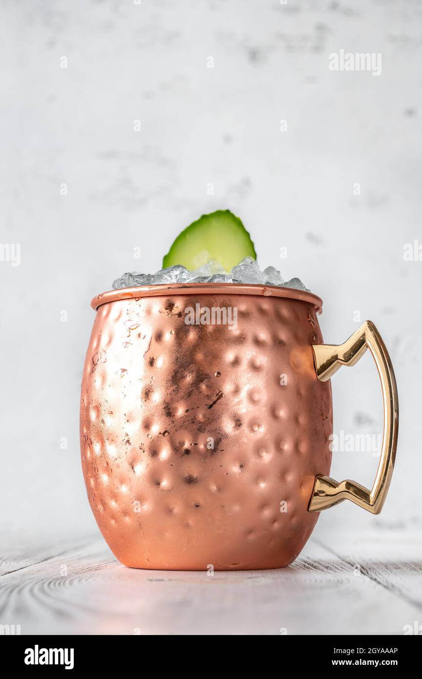 Mug of Sober Mule mocktail garnished with cucumber Stock Photo - Alamy