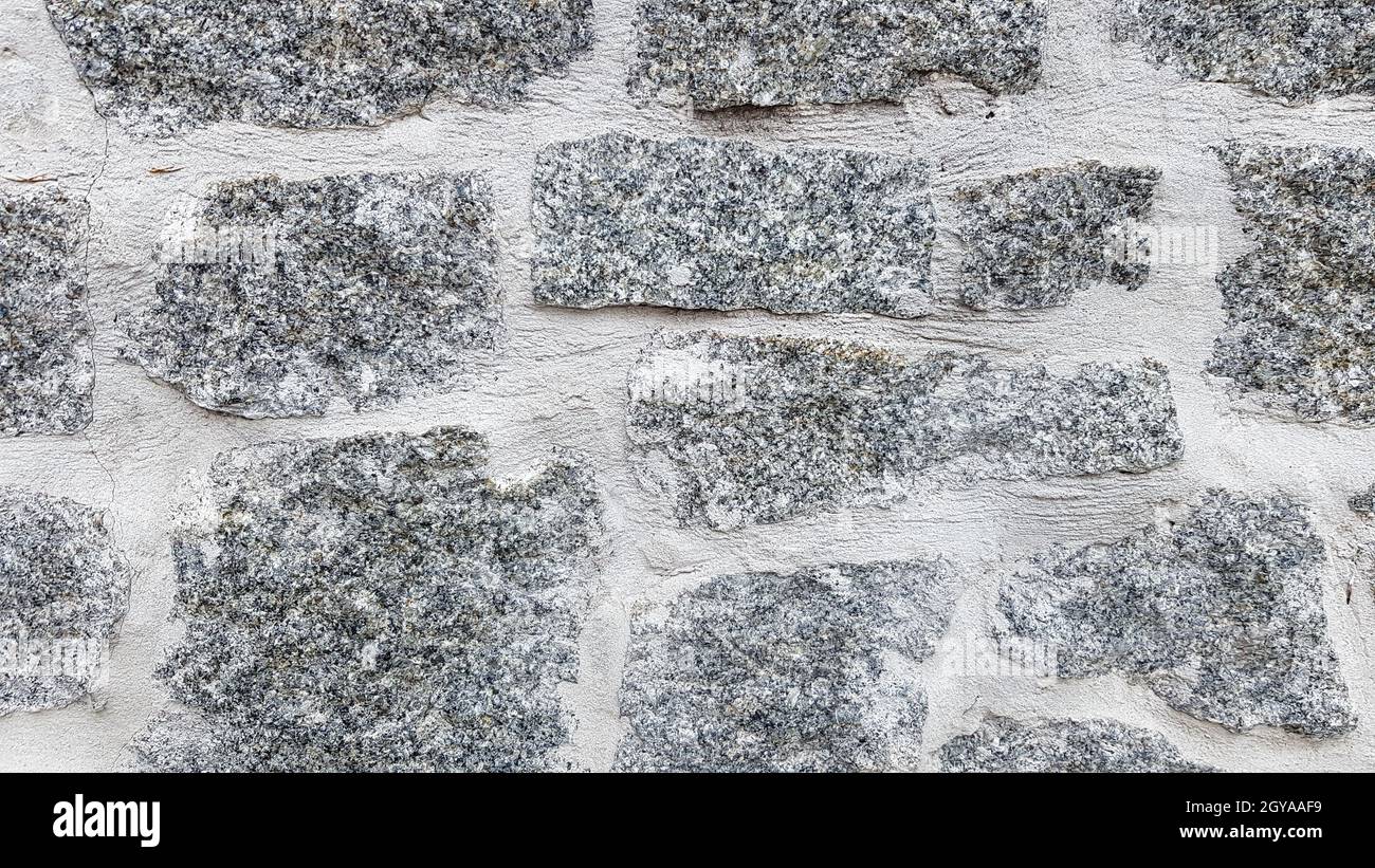 Gray stone wall background. The texture of the stone. Old castle wall ...