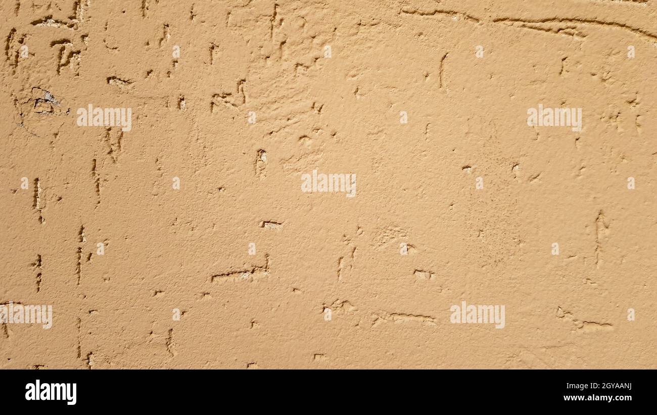 Old gold plaster wall texture yellow background. Textured textured wall ...