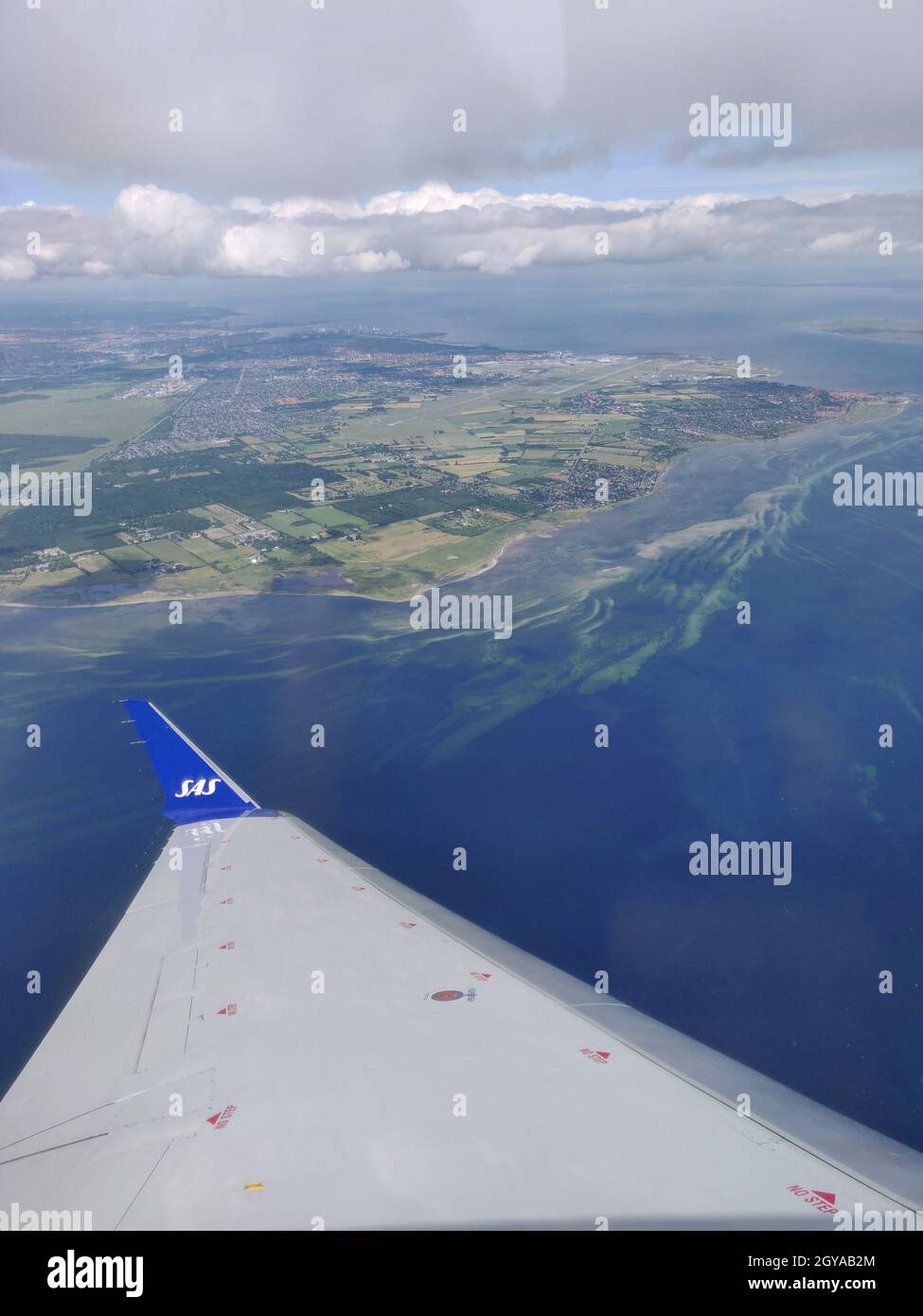 COPENHAGEN, DENMARK - Jul 02, 2020: An airplane flying over Copenhagen ...