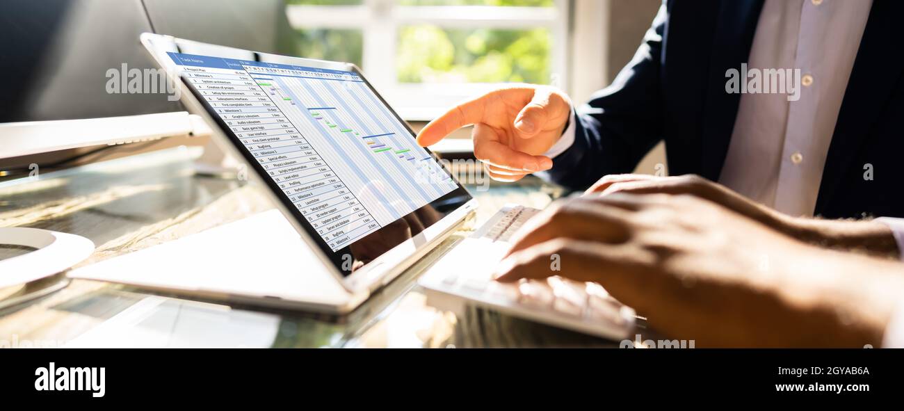 Digital Gantt Chart On Laptop In Office Stock Photo - Alamy