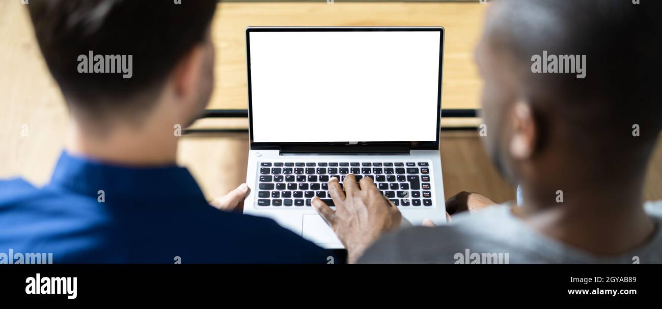Couple Looking At Empty Laptop Computer Screen Stock Photo - Alamy