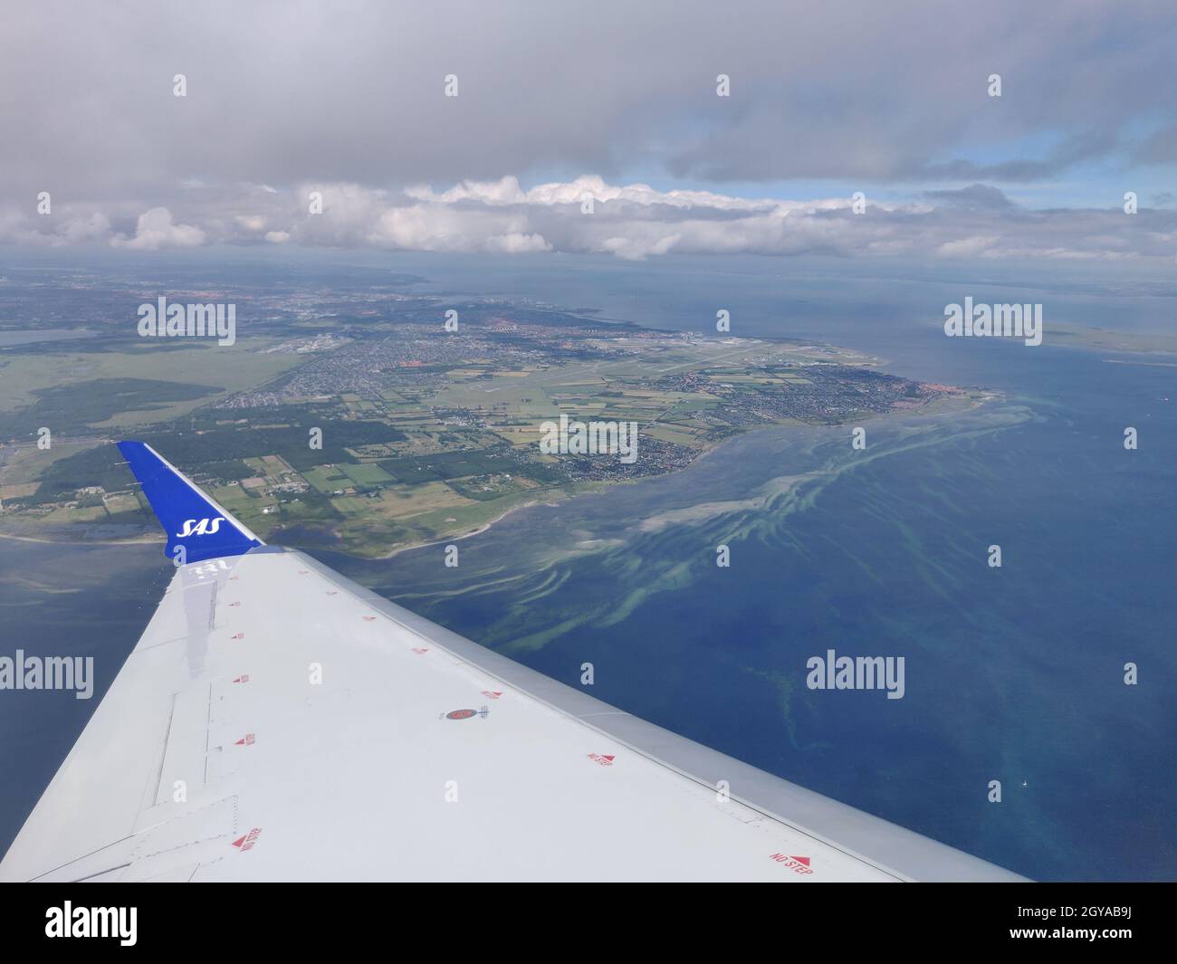 COPENHAGEN, DENMARK - Jul 02, 2020: An airplane flying over Copenhagen ...