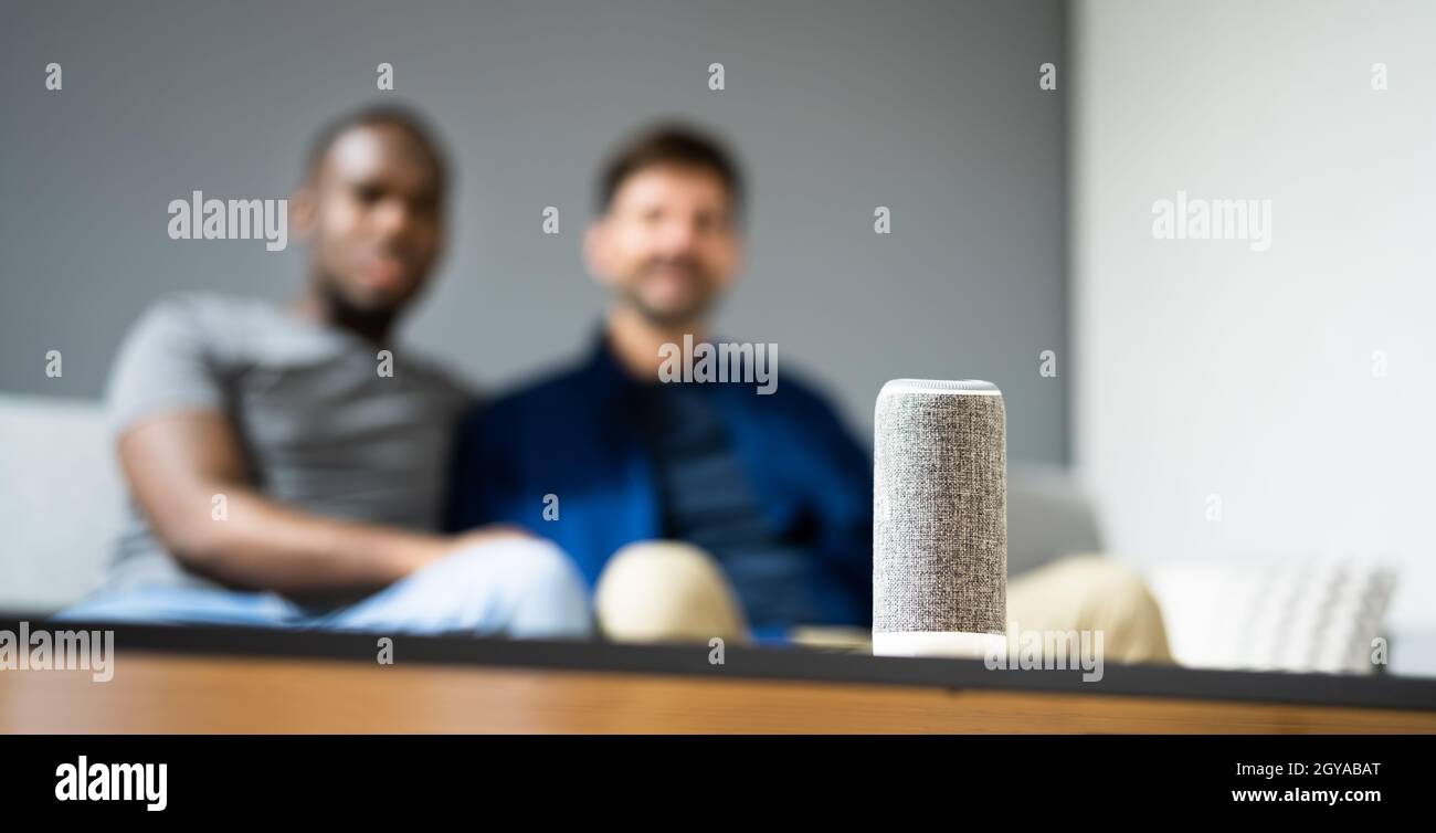 Smart Speaker And Wireless Voice Assistant. Listening Music Stock Photo ...