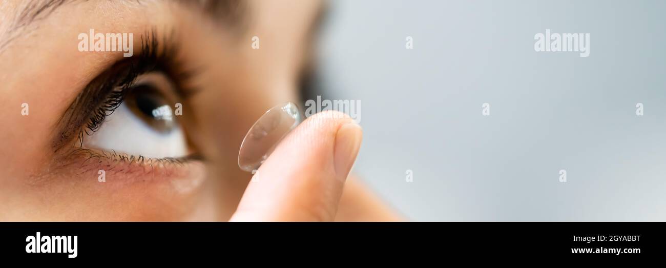 Inserting Contact Lens In Eye. Ophthalmology Eyewear Stock Photo - Alamy