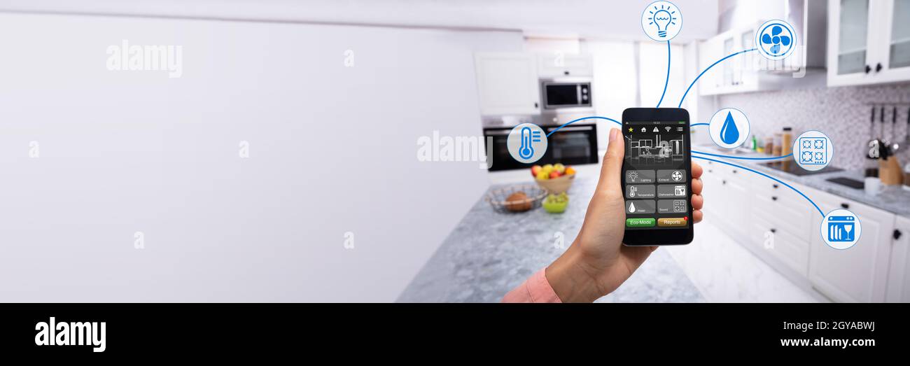 African Woman Using Smart House Technology App Stock Photo - Alamy