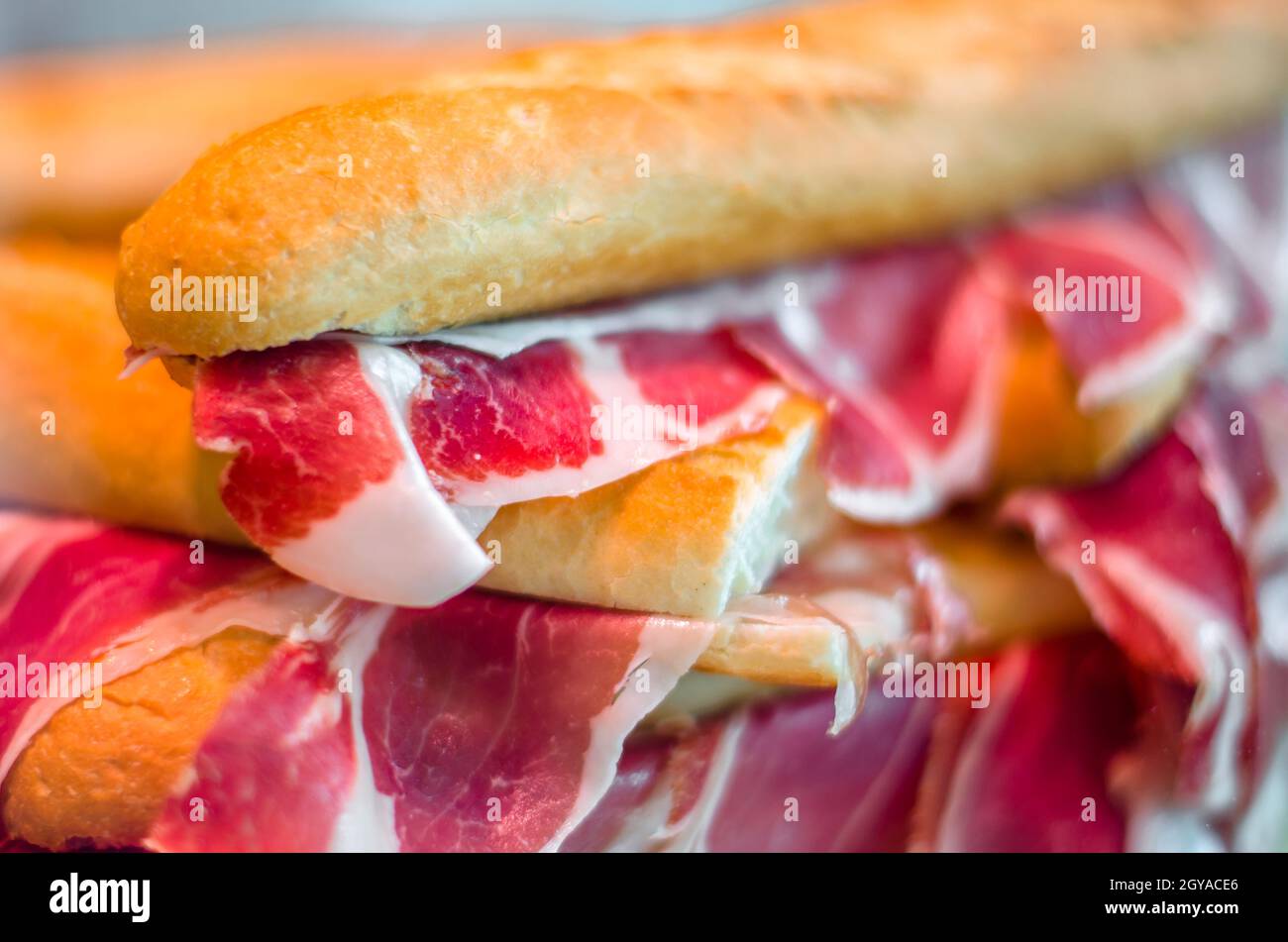 Detail of an Iberian ham (jamon iberico) sandwich Stock Photo - Alamy