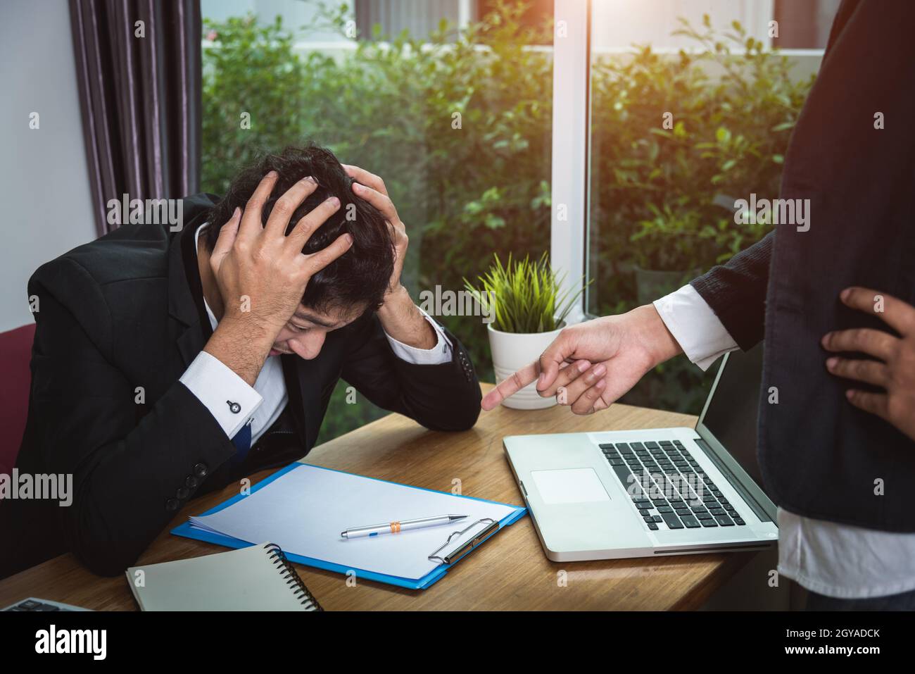 Business man manager complain team seriously discussing in the office ...