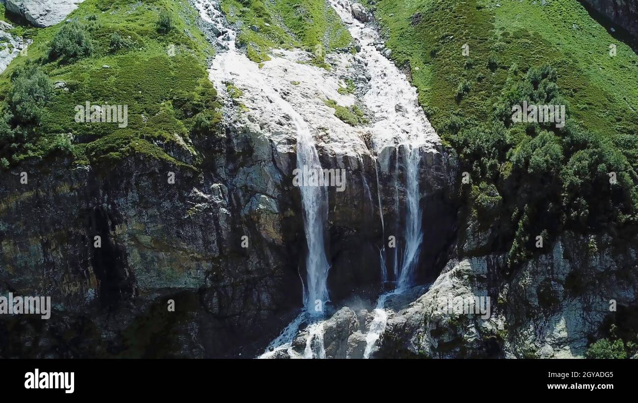 Close-up raging mountain waterfalls. Aerial view of giant waterfall ...