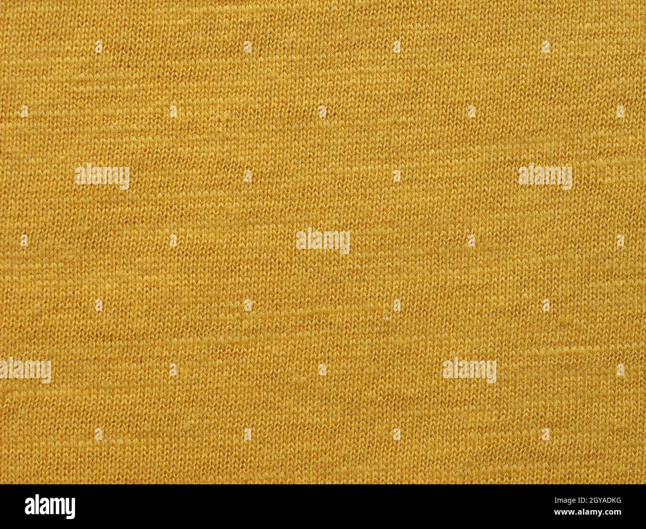 yellow cotton fabric texture useful as a background Stock Photo - Alamy