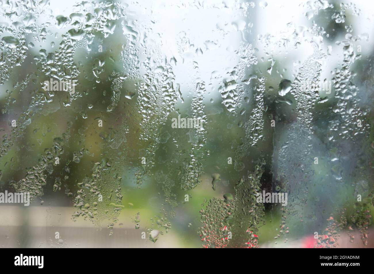 Rain falling on car window hi-res stock photography and images - Alamy