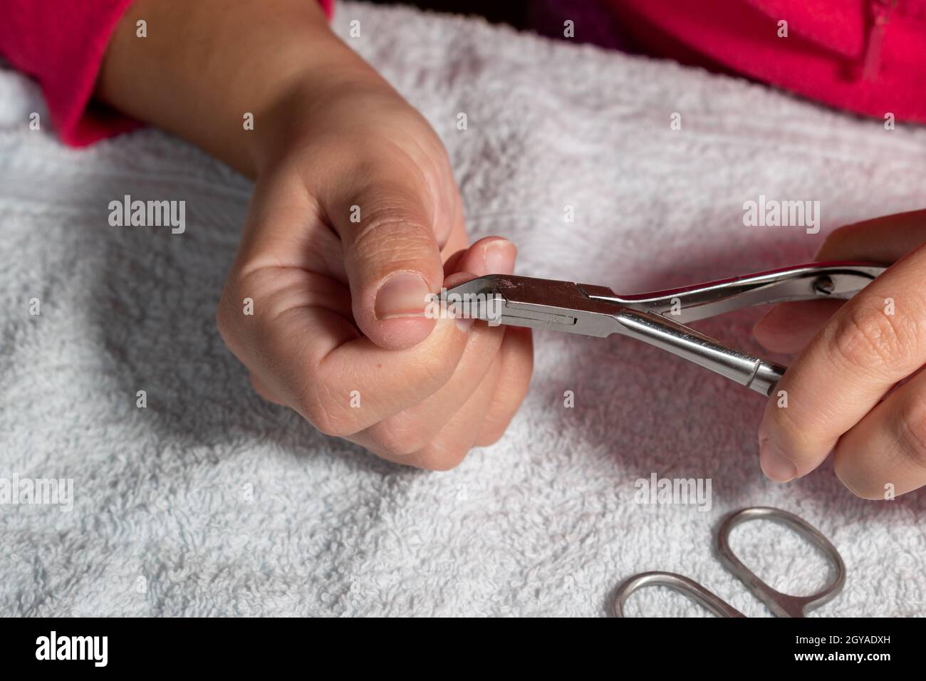 Cutting cuticles hi-res stock photography and images - Alamy