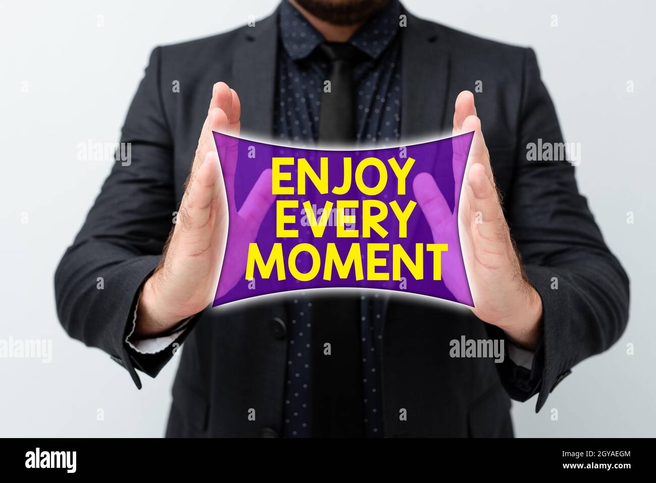 Hand writing sign Enjoy Every Moment, Business idea stay positive ...