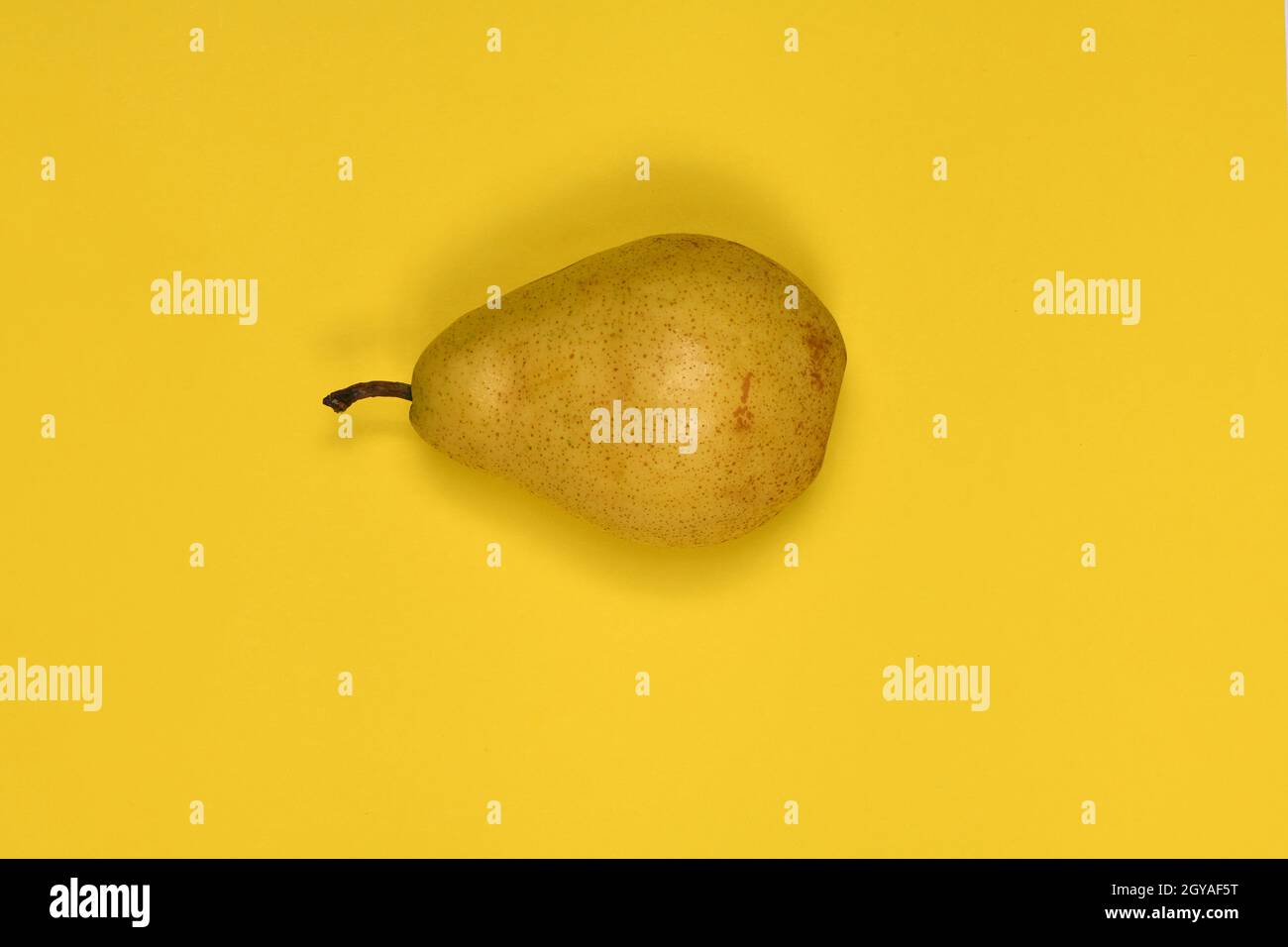 Pears isolated on yellow background. Pears macro studio photo. High ...