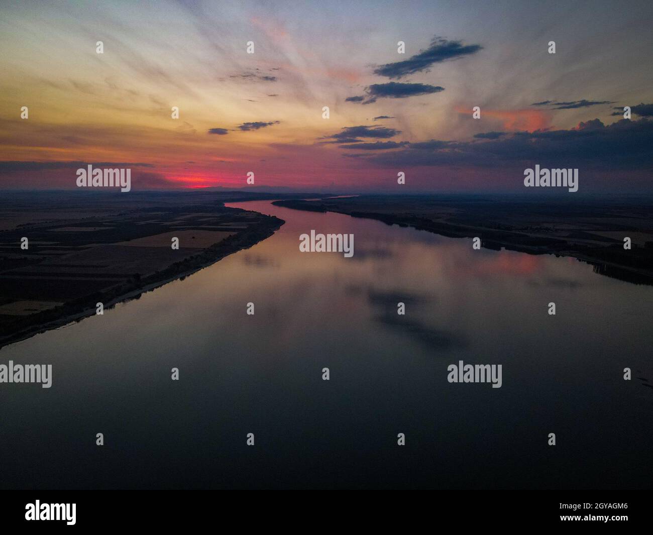 Mesmerizing view of Danube river at scenic sunset in Romania Stock ...