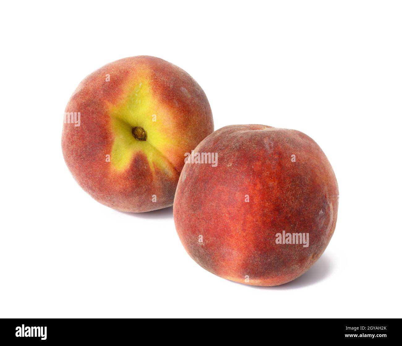 two ripe red peaches isolated on white background Stock Photo - Alamy
