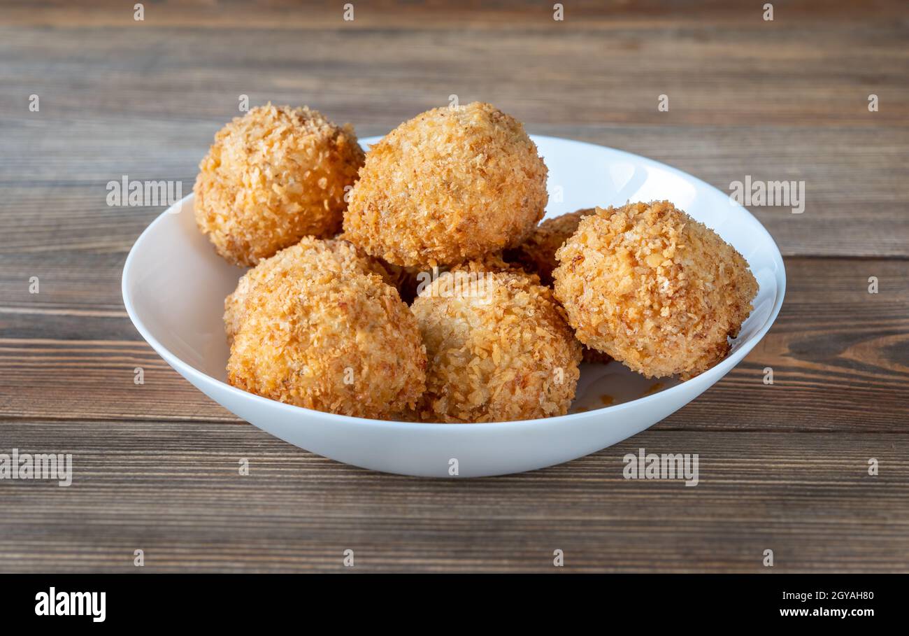 Bowl of breaded and deep fried Croquettes Stock Photo - Alamy